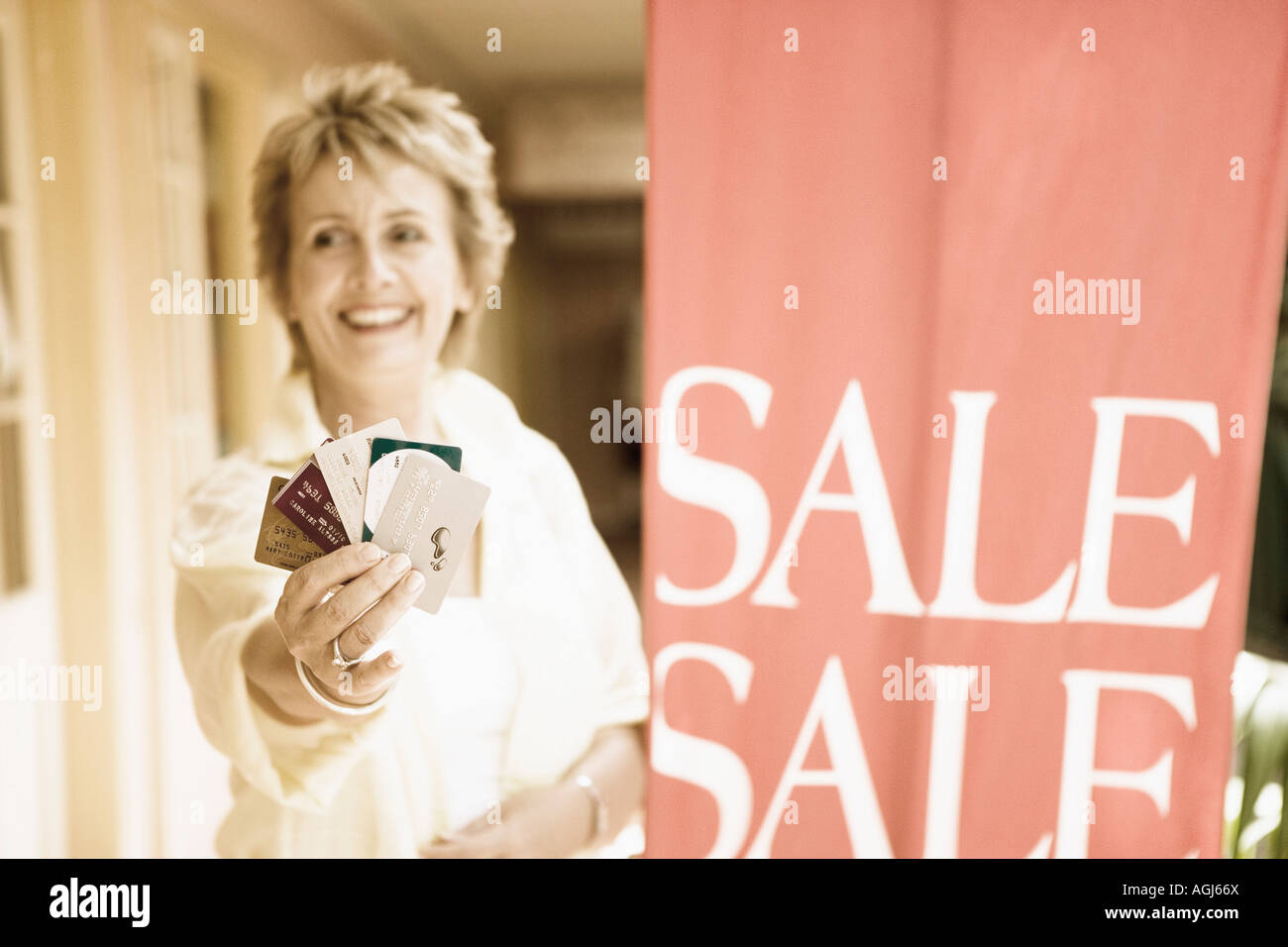 Mature woman credit cards hi-res stock photography and images - Alamy