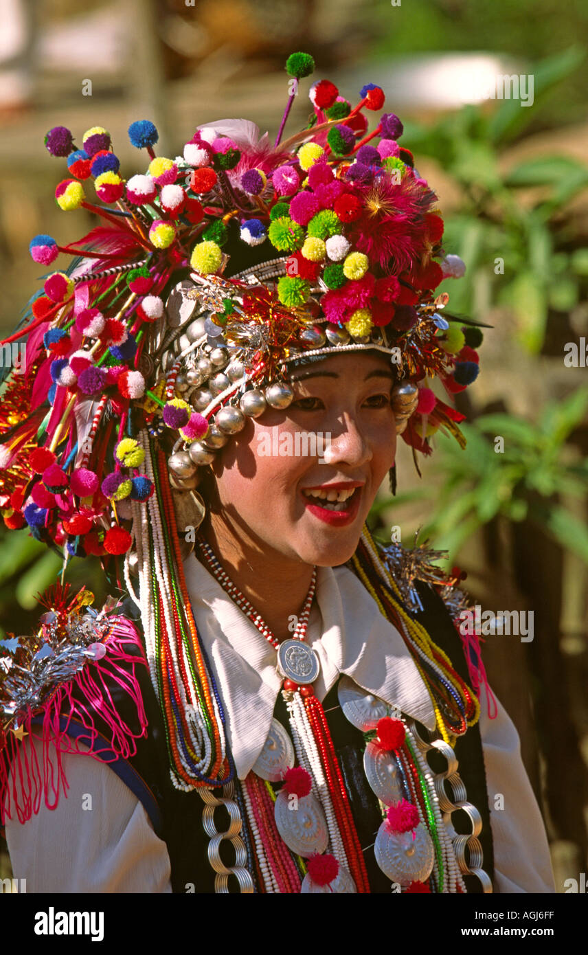 China Yunnan Xiao Hu La village Akha Hani woman in traditional festival ...