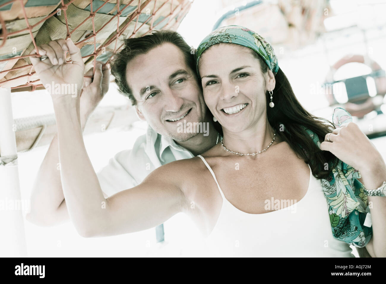 Mid adult couple smiling Stock Photo - Alamy