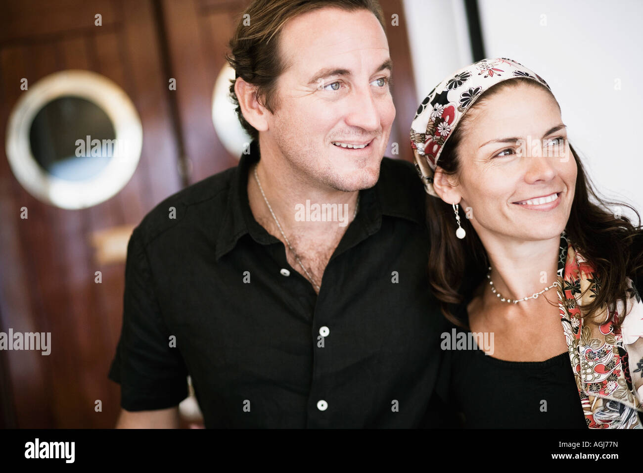 Mid adult couple smiling Stock Photo - Alamy