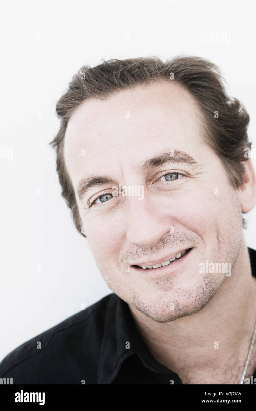Portrait of a mid adult man smiling Stock Photo - Alamy
