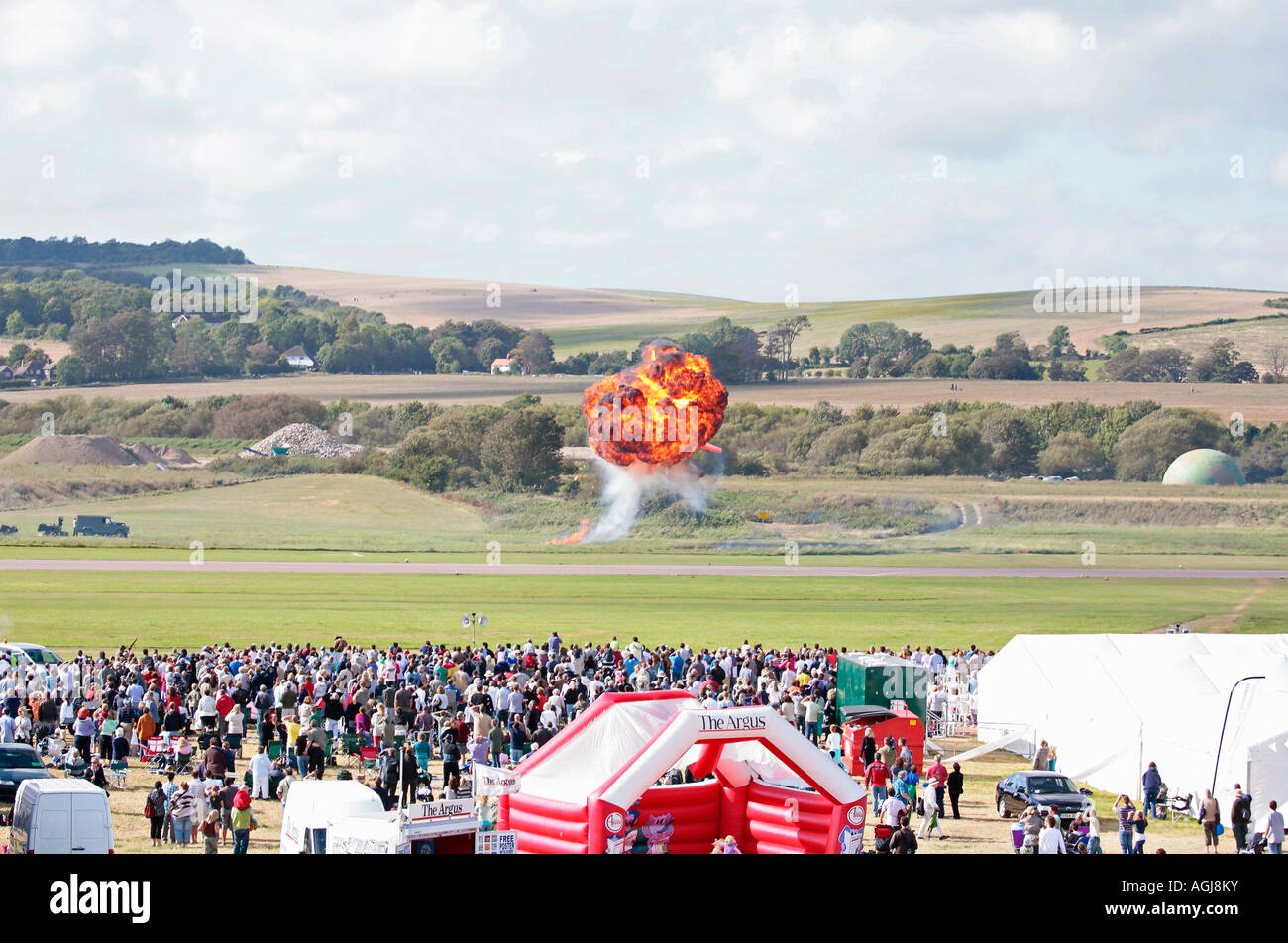 Spectators watching pyrotechnic display at UK airshow. Shoreham airshow ...