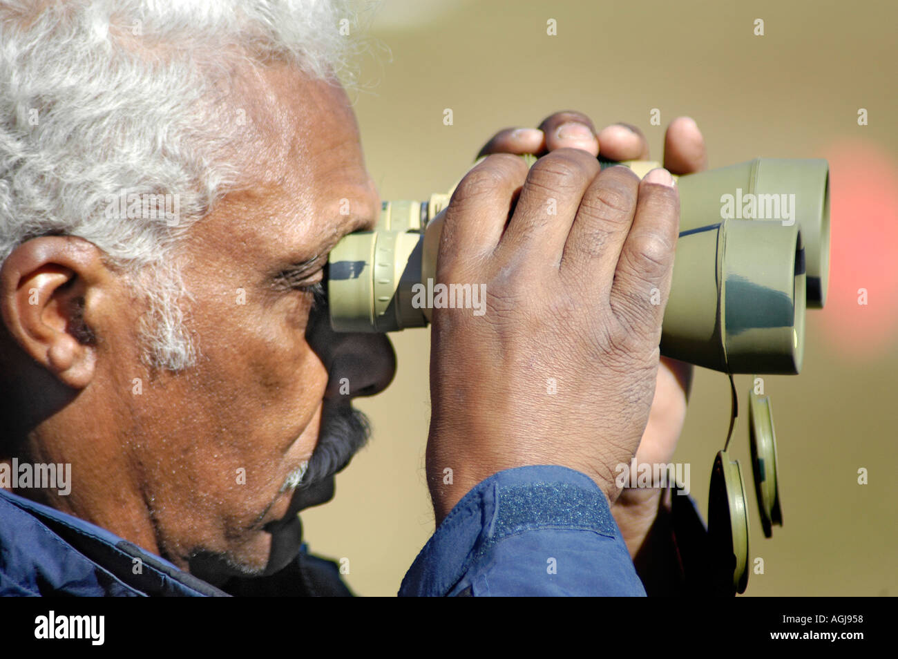 66 year old black man watching his grandson play football some with ... 66 year old black man watching his grandson play football some with ...