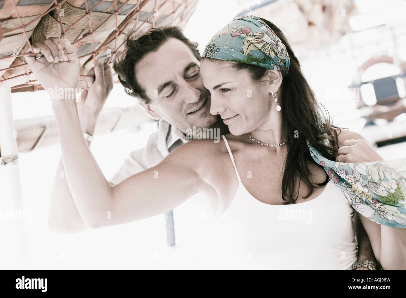Mid adult couple romancing Stock Photo - Alamy