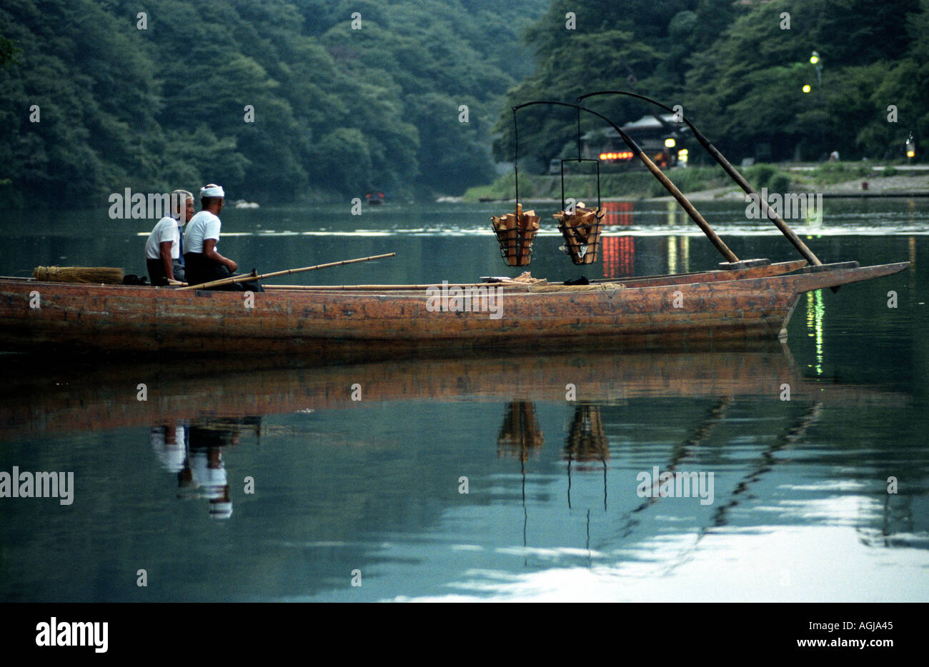 Ukai fishing professionals wait on traditional boats Ubune for dark to ...