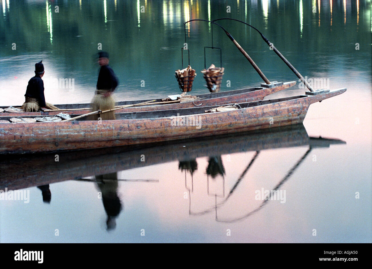 Ukai fishing professionals wait on traditional boats Ubune for dark to ...