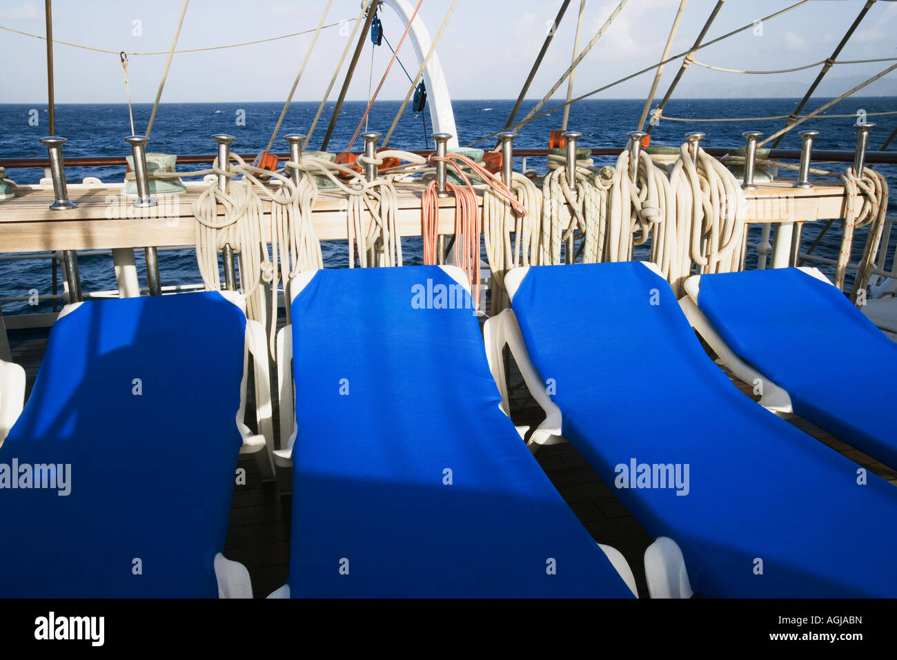 Lounge chairs on a sailing ship Stock Photo - Alamy