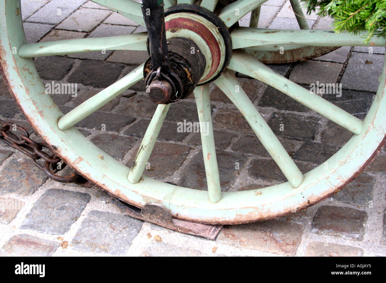 old chock block on wooden wheel of a horse carriage Bad Toelz Bavaria ...