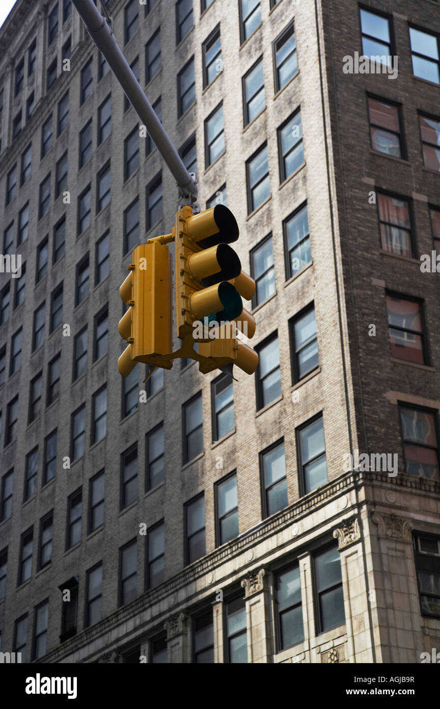 Traffic lights on horizontal pole in Manhattan, New York against the ...