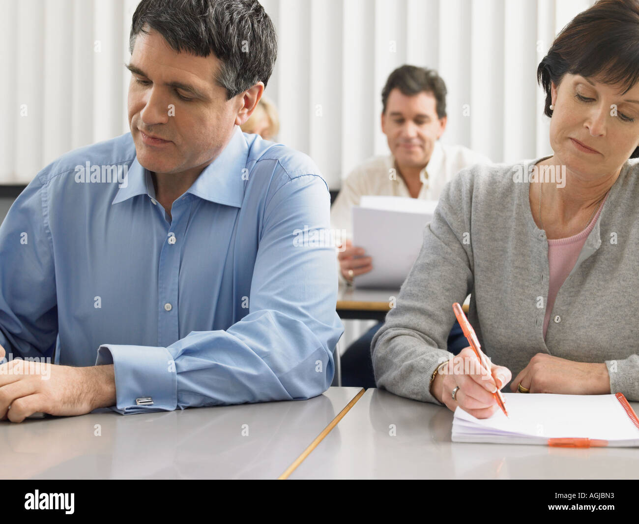 Mature students in a lesson Stock Photo - Alamy