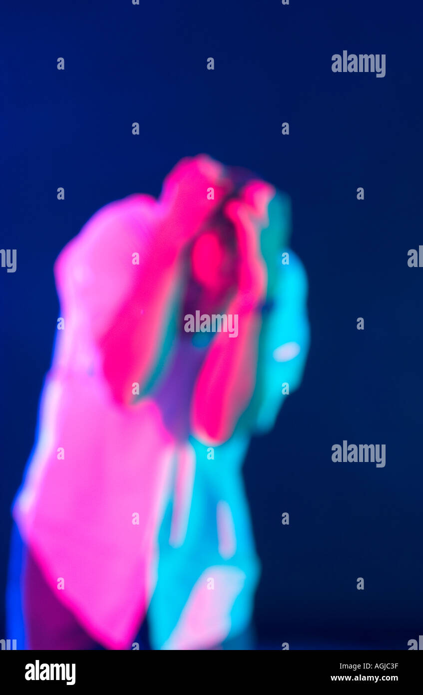 Blurred figure acting frustrated Stock Photo - Alamy