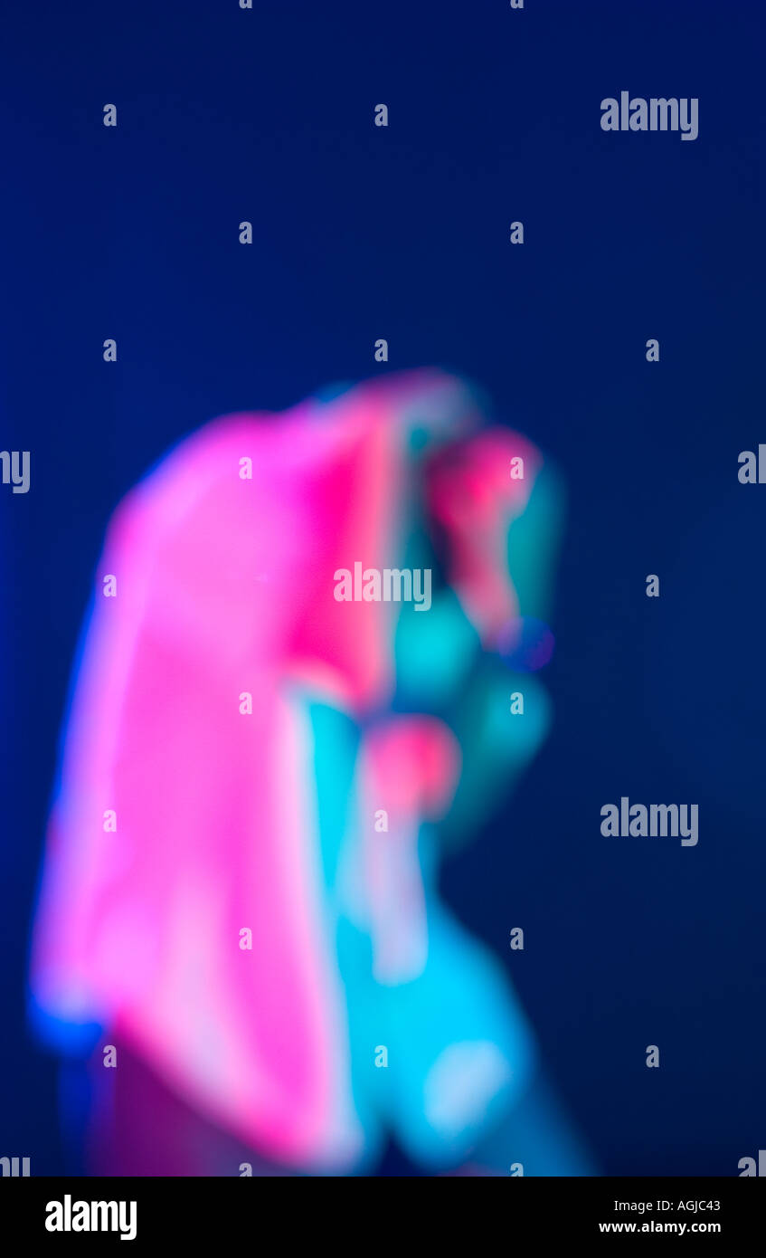 Blurred figure covering head Stock Photo - Alamy