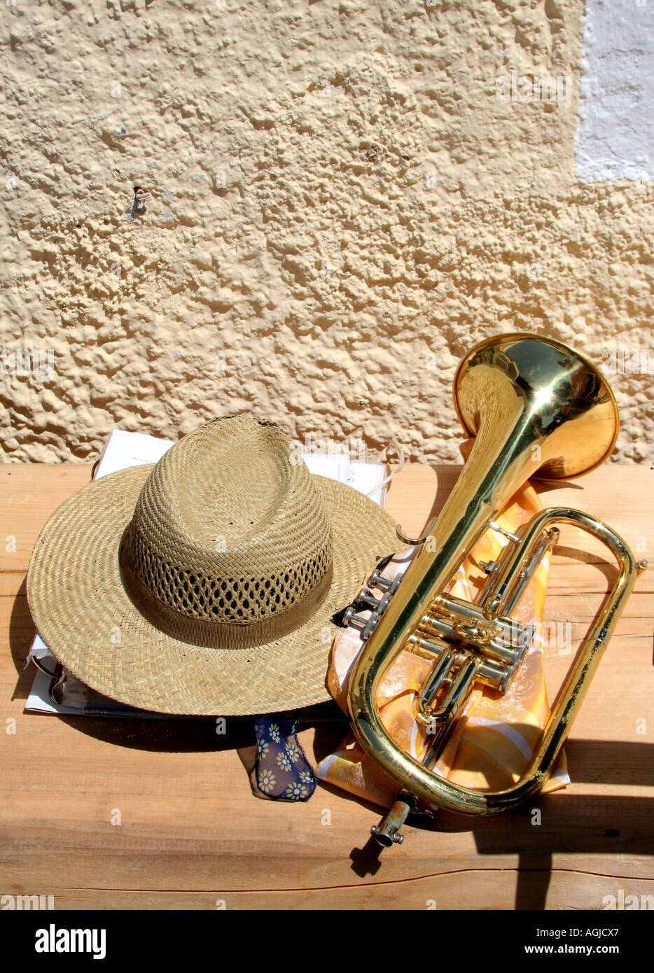straw hat and trumpet on a bench Bavaria Germany Stock Photo - Alamy