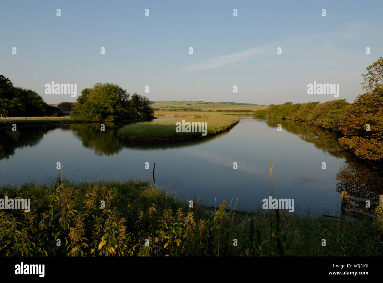 The River Cuckmere meanders its way through well drained alluvial ...