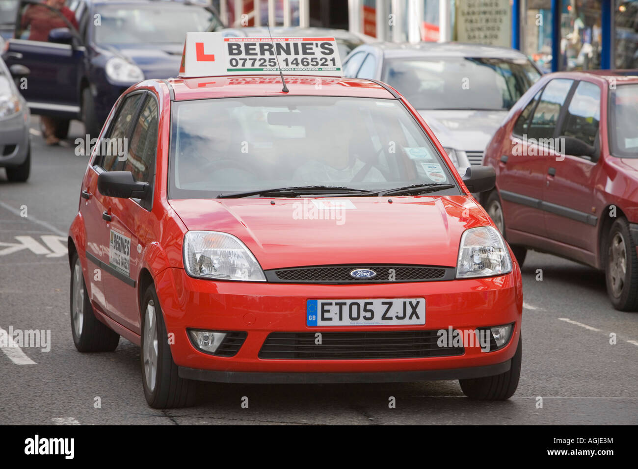 A learner driver learning to drive in Ambleside, Cumbria, UK Stock ...