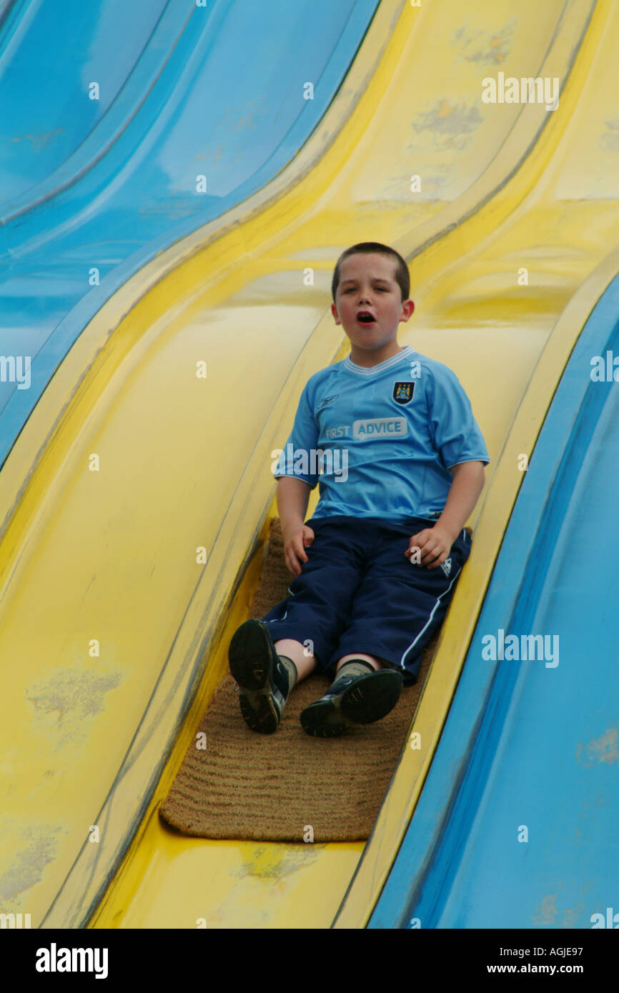 child on a wavy slide Stock Photo - Alamy