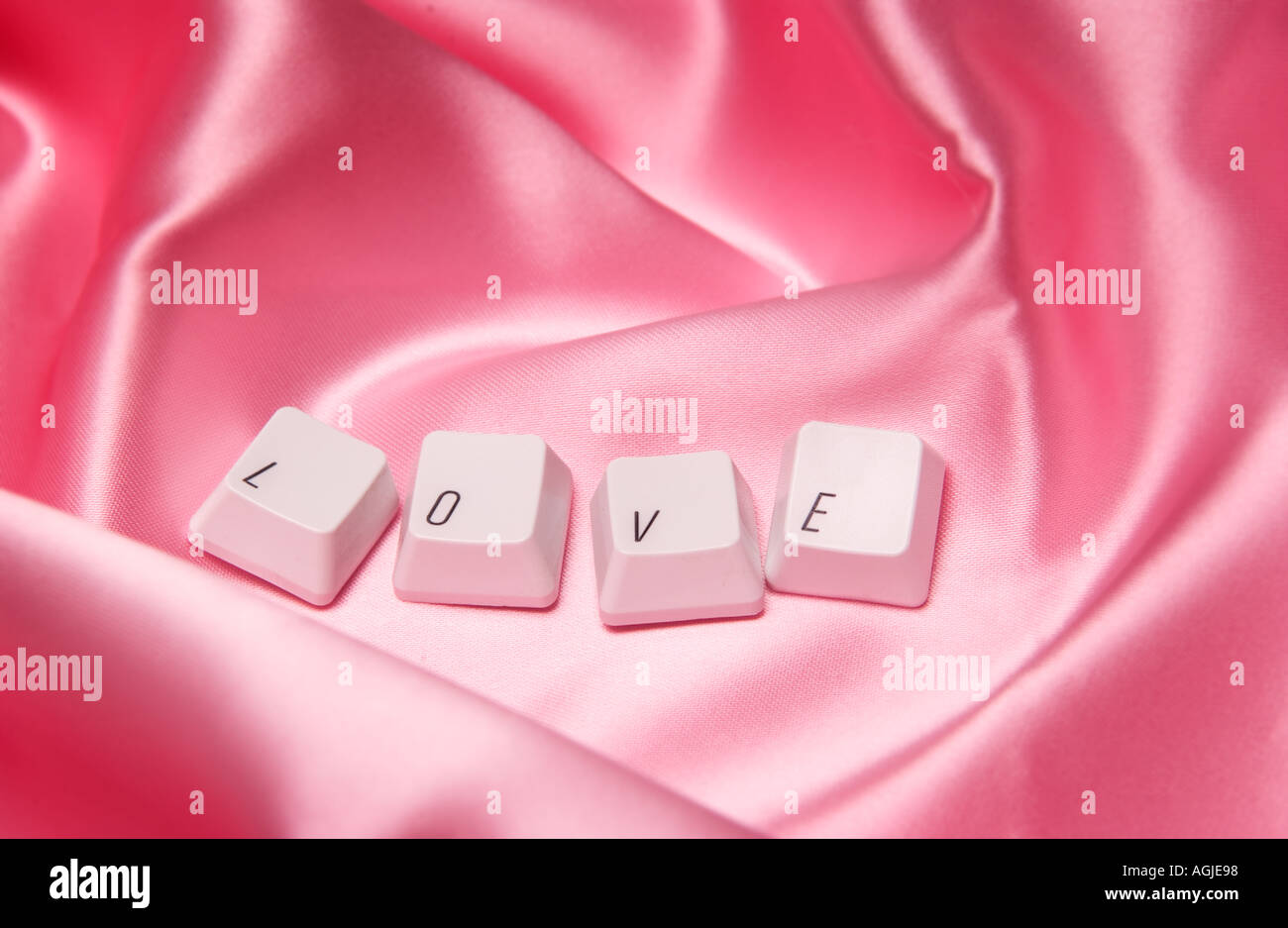 Love spelled out in keys from keyboard Stock Photo - Alamy