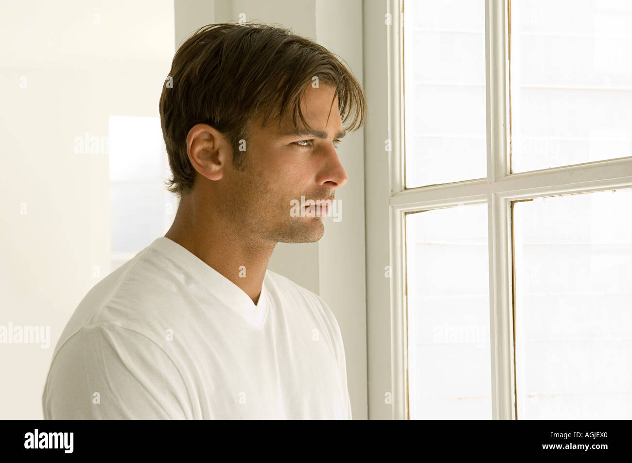 Man dark alone window hi-res stock photography and images - Alamy