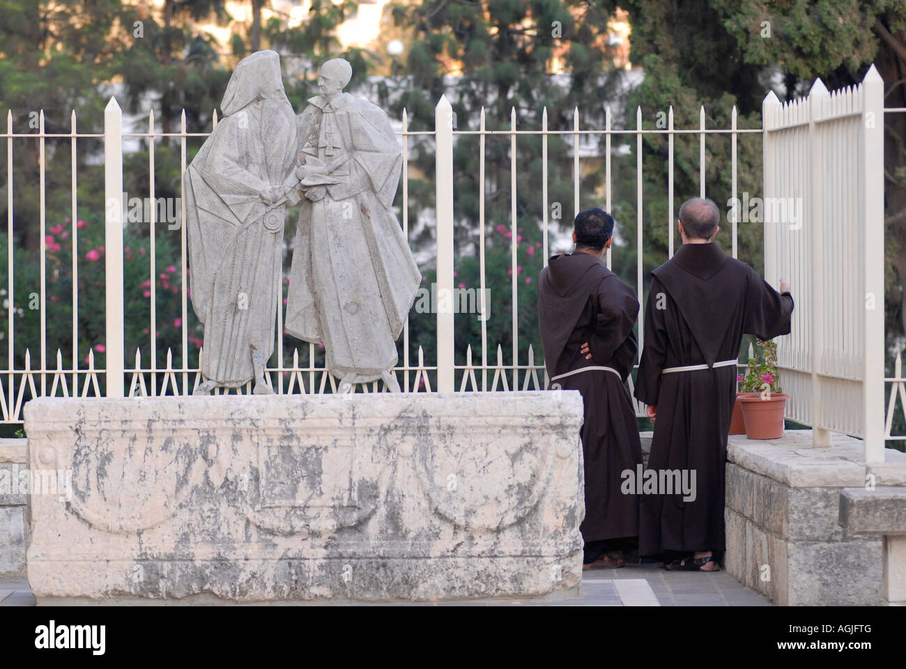 Two Franciscan friars at the courtyard of the Church of the ...