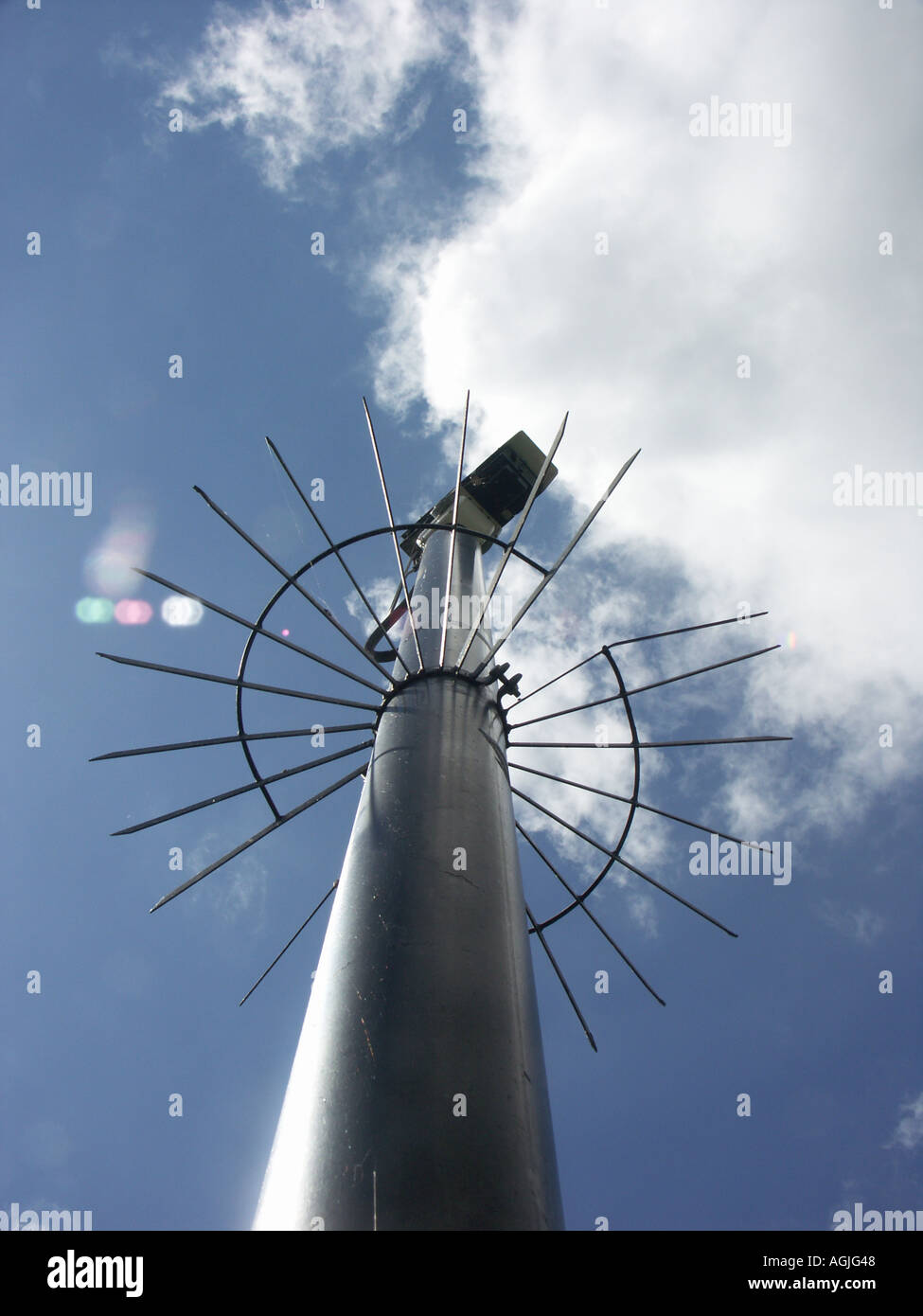 CCTV Camera and spiked guard Stock Photo - Alamy