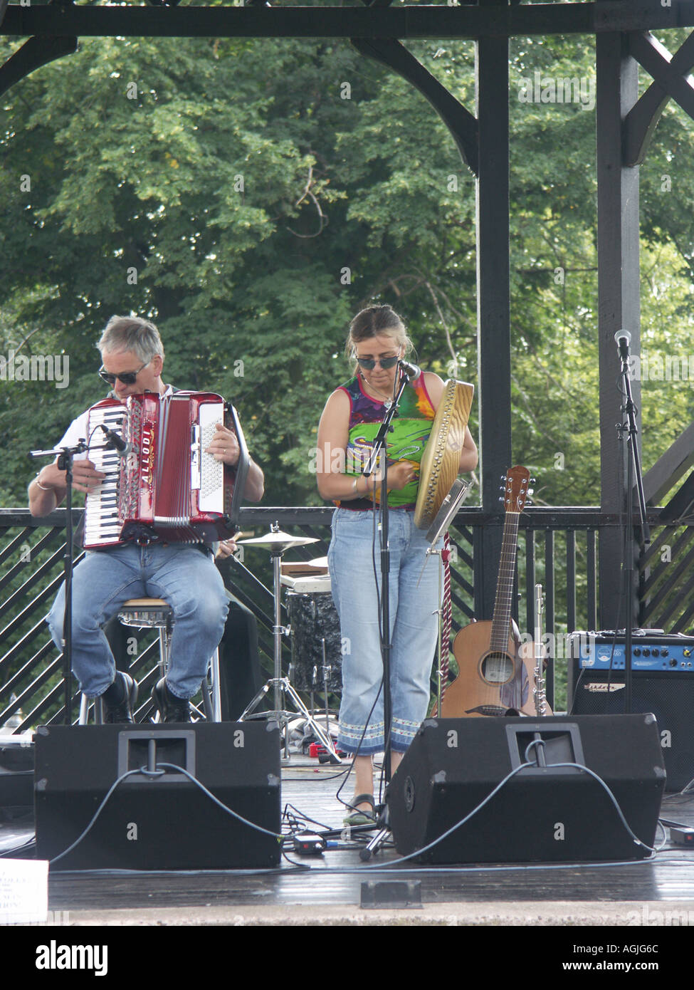 An outdoor musical performance by various musicians in the traditional ...