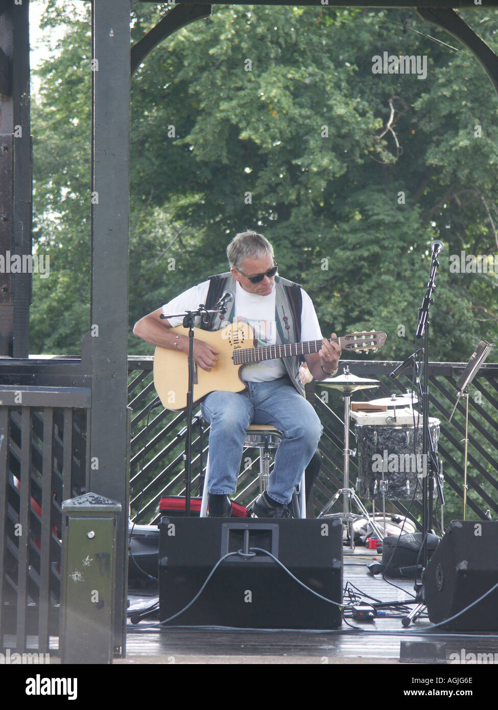 An outdoor musical performance by various musicians in the traditional ...