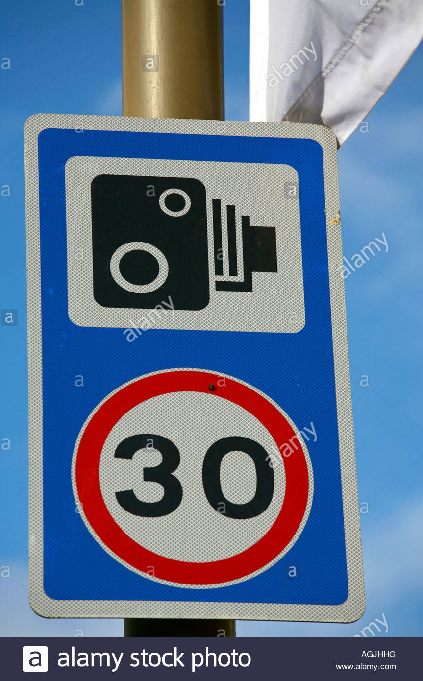 Cameras in force and 30 speed limit sign Stock Photo - Alamy