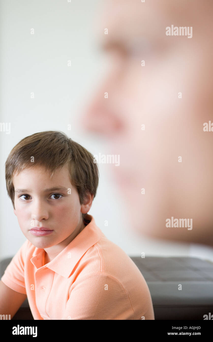 Boy and blurred father Stock Photo - Alamy