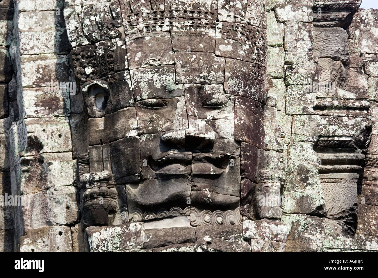 the carved faces of bayon temple Stock Photo - Alamy
