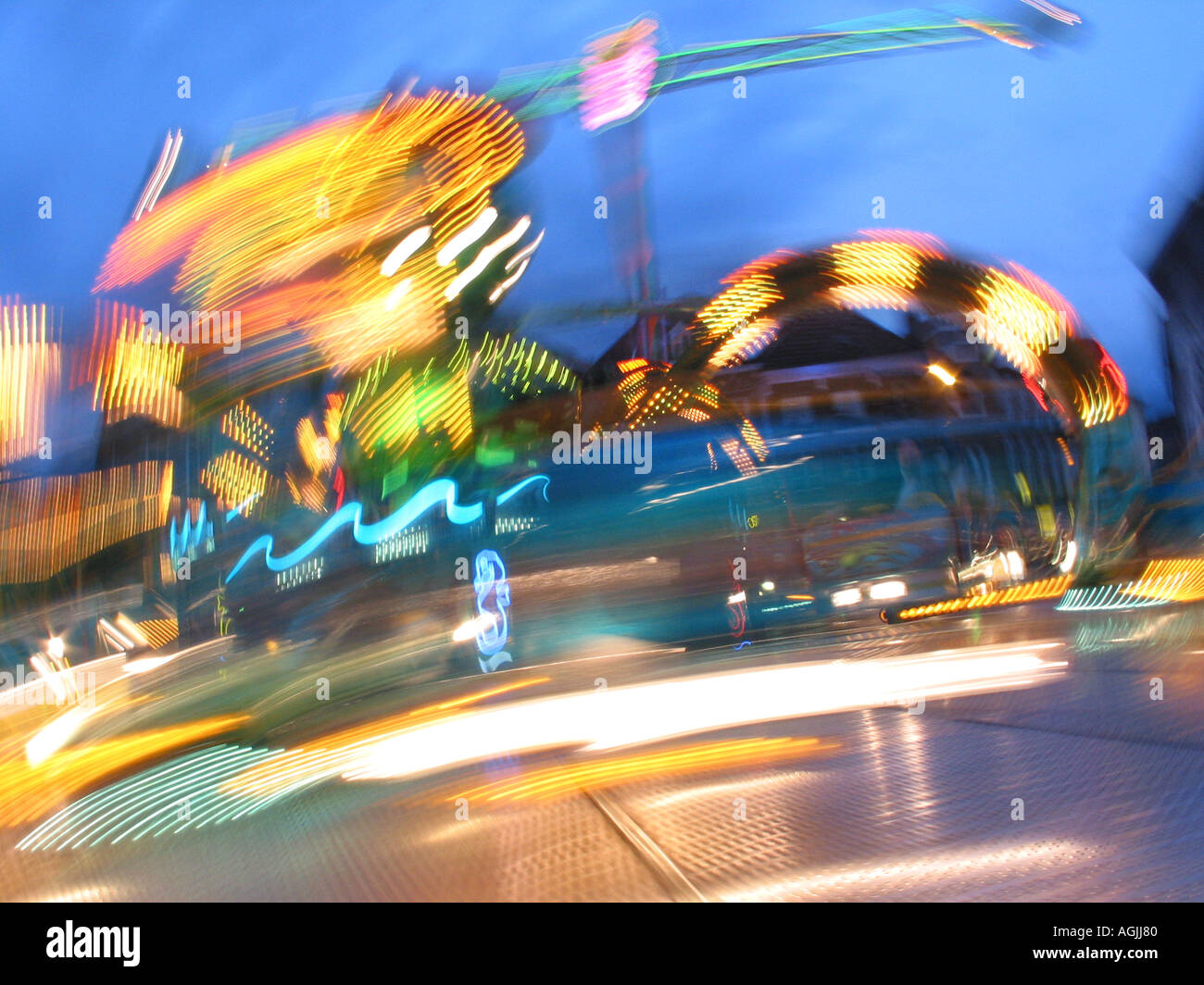 fairground ride in motion Stock Photo - Alamy