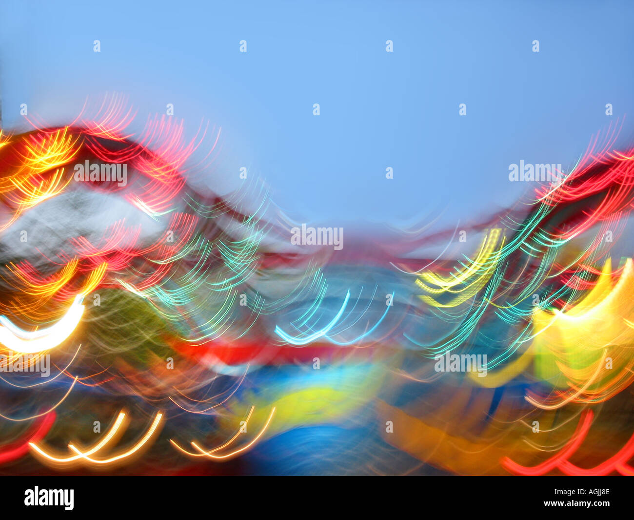 abstract light streaks at fun fair at dusk Stock Photo - Alamy