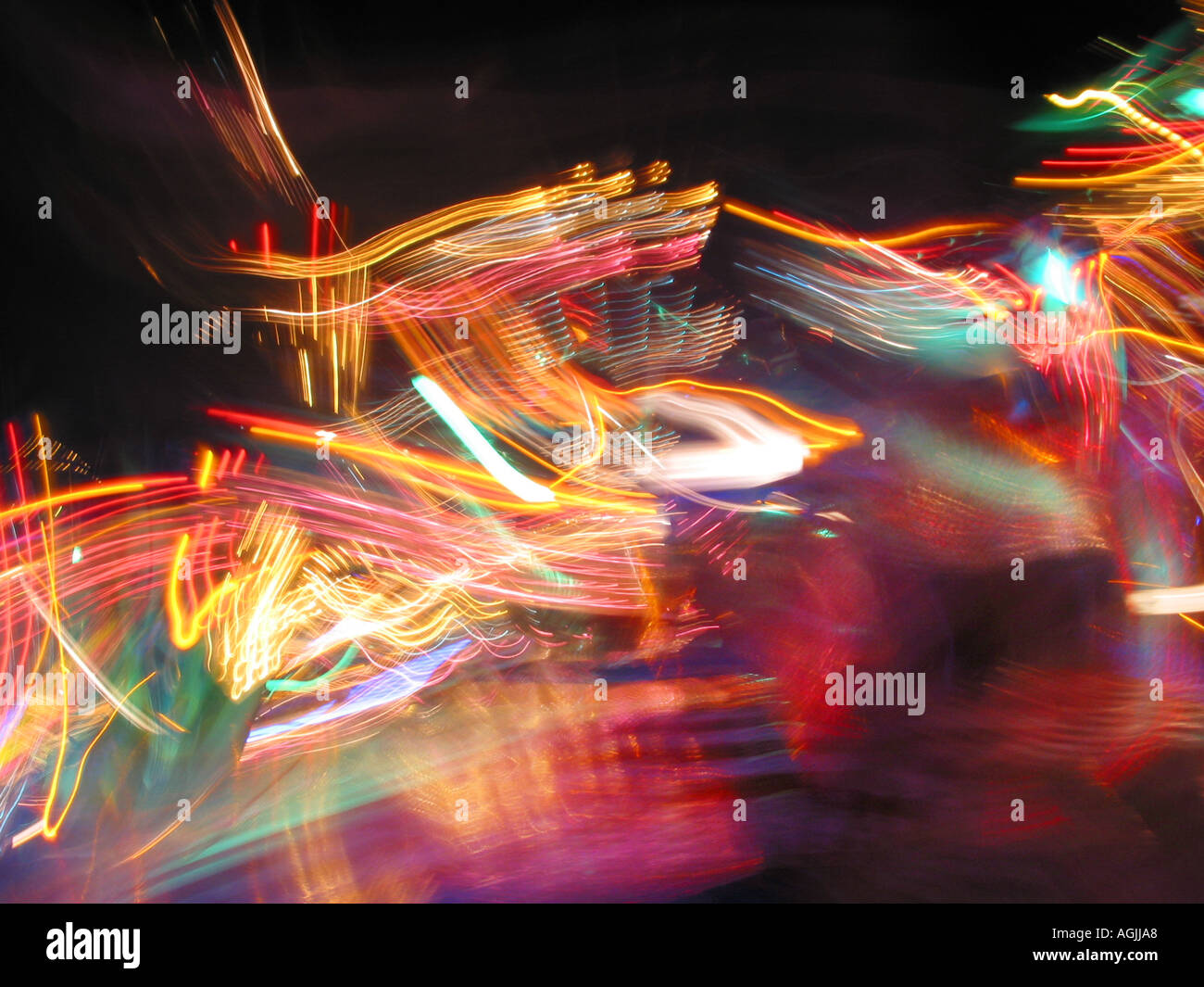 abstract light streaks at fairground at night Stock Photo - Alamy