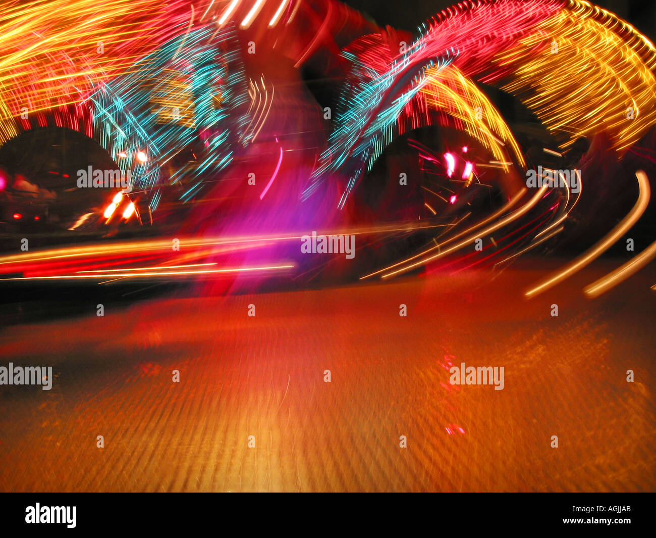 abstract light streaks at fairground at night Stock Photo - Alamy