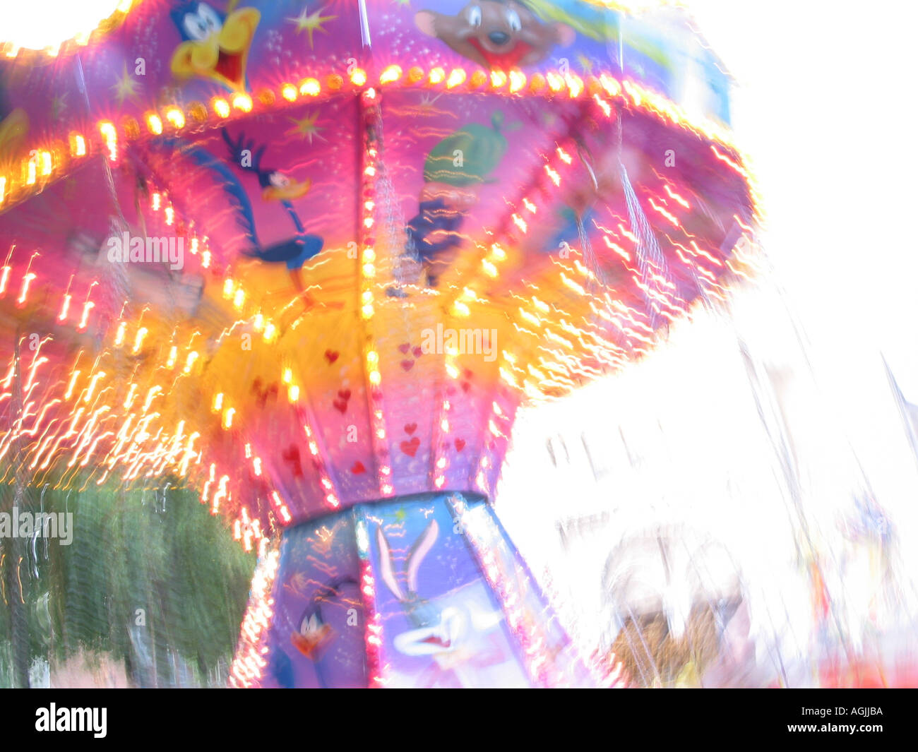 fairground carousel in full swing Stock Photo - Alamy
