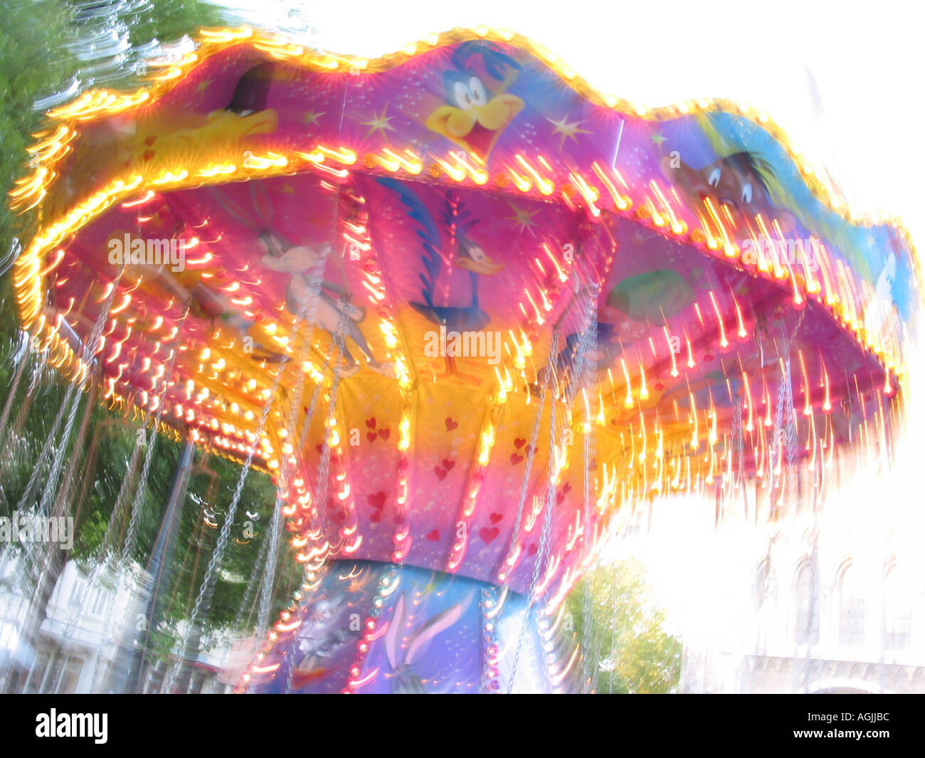 fairground carousel in motion Stock Photo - Alamy