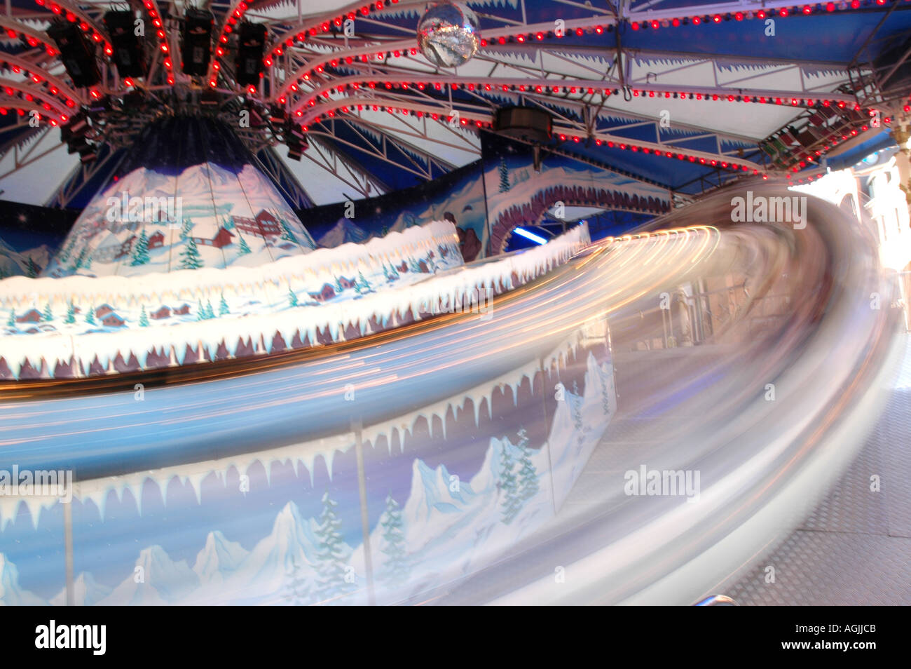 colourful fairground ride in motion Stock Photo - Alamy