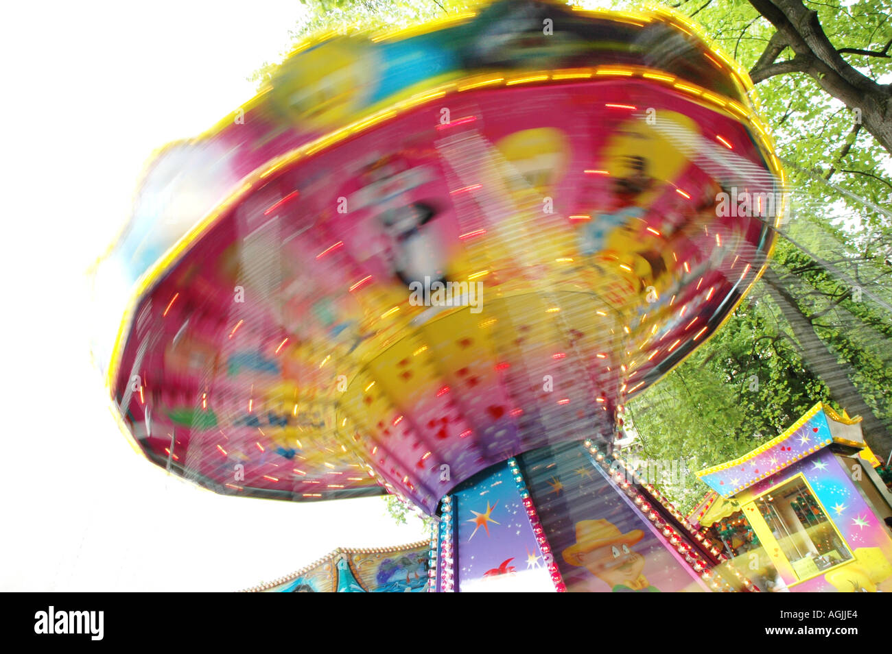 fairground carousel in motion Stock Photo - Alamy