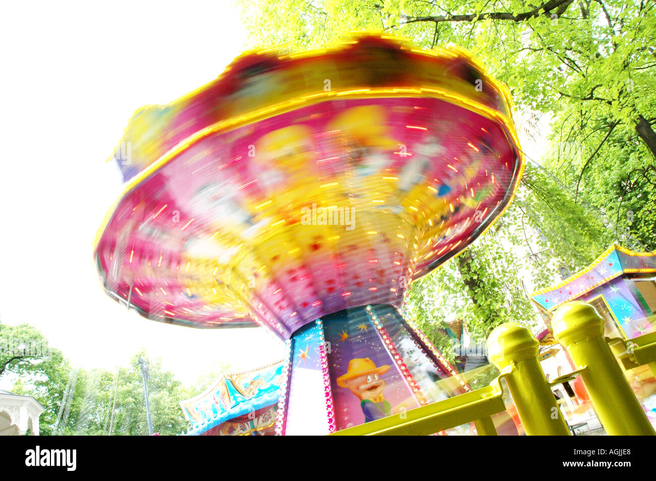 high key image of vintage fairground carousel in motion Stock Photo - Alamy