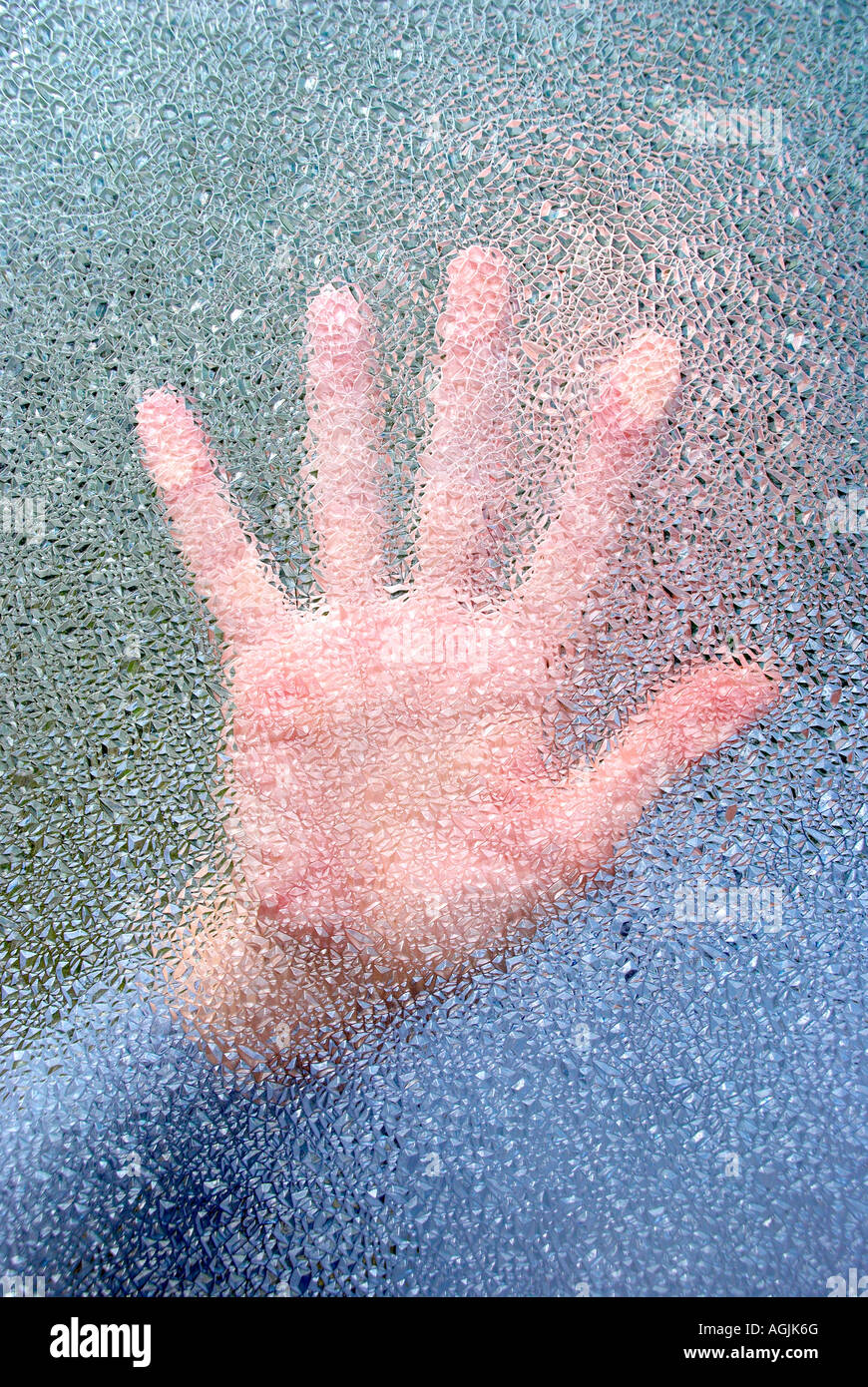Hand on a glass window Stock Photo - Alamy