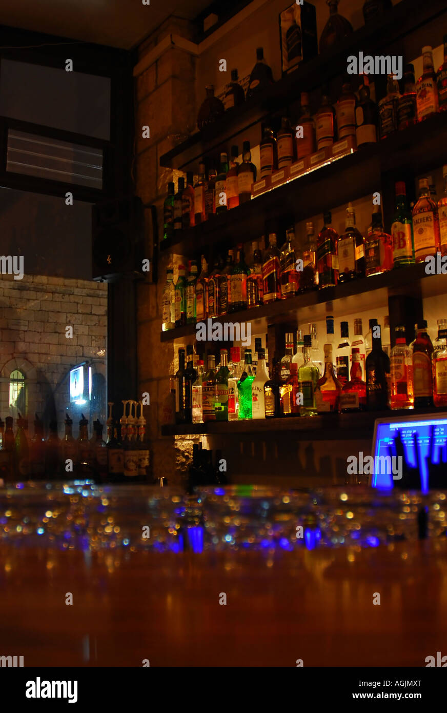 Dimly lit Interior of a bar Stock Photo - Alamy