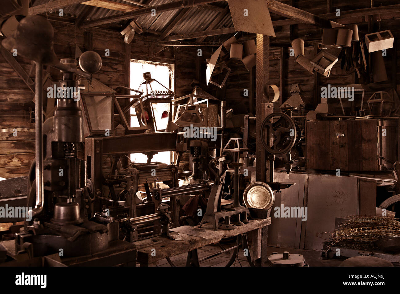 an old busy and cluttered workshop in russet Stock Photo - Alamy