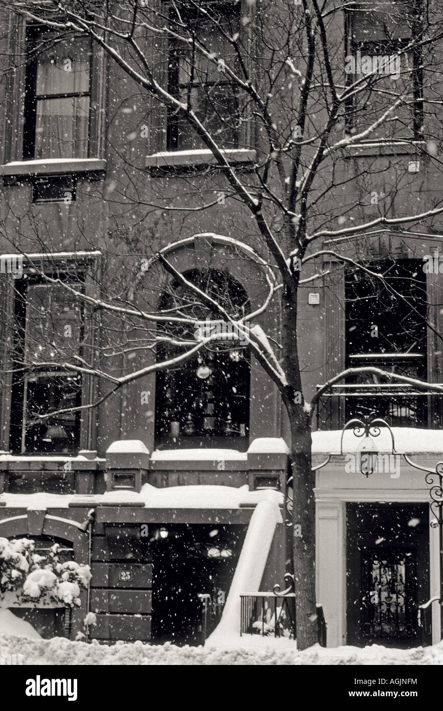 Murray Hill Brownstone in snowfall cooking pots in window New York City ...