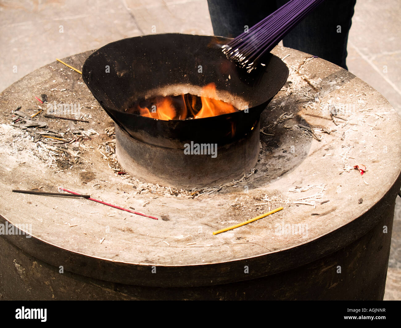 incense sticks being lit in an open fire Stock Photo - Alamy