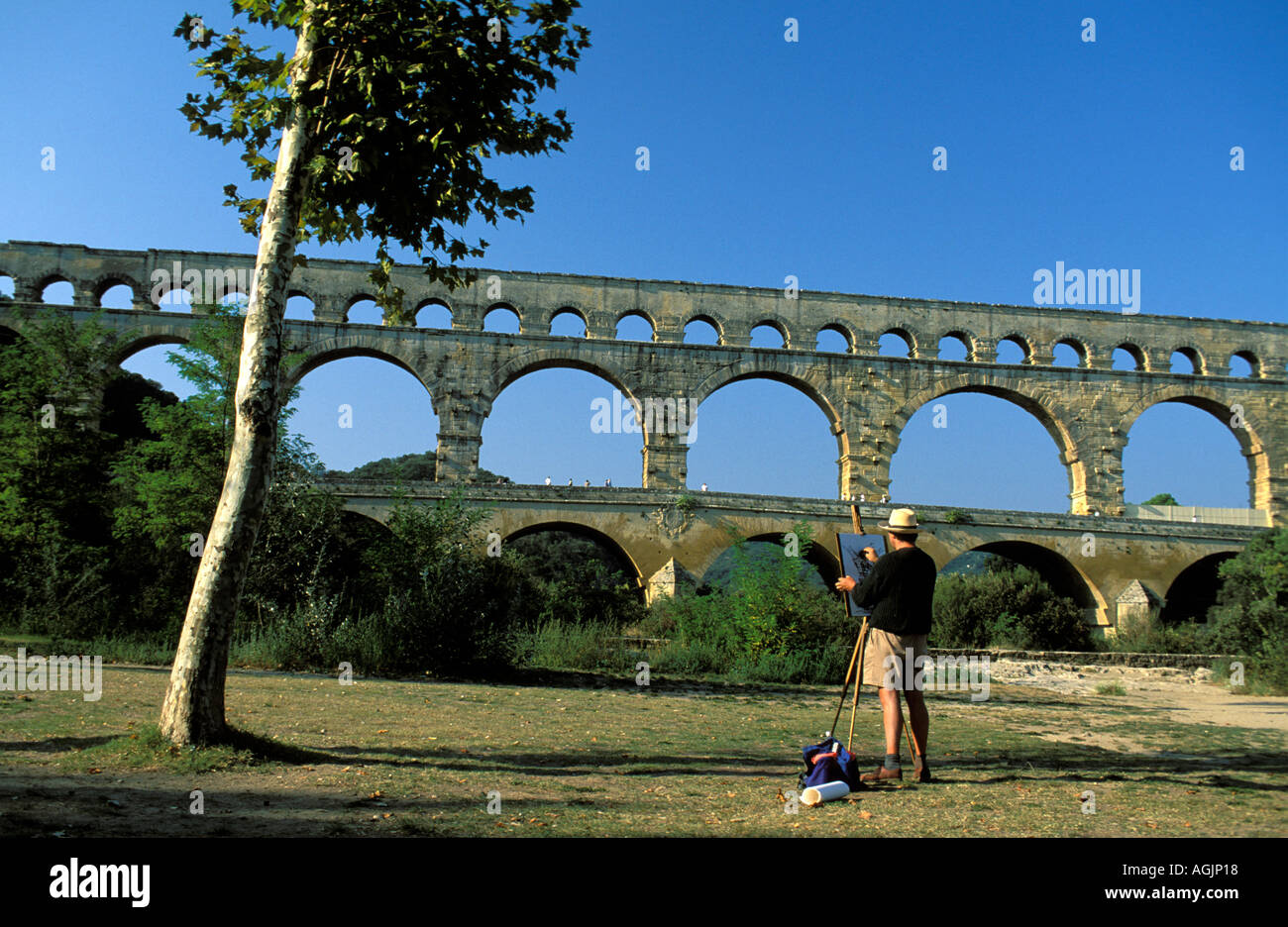 Gard pont with men hi-res stock photography and images - Alamy