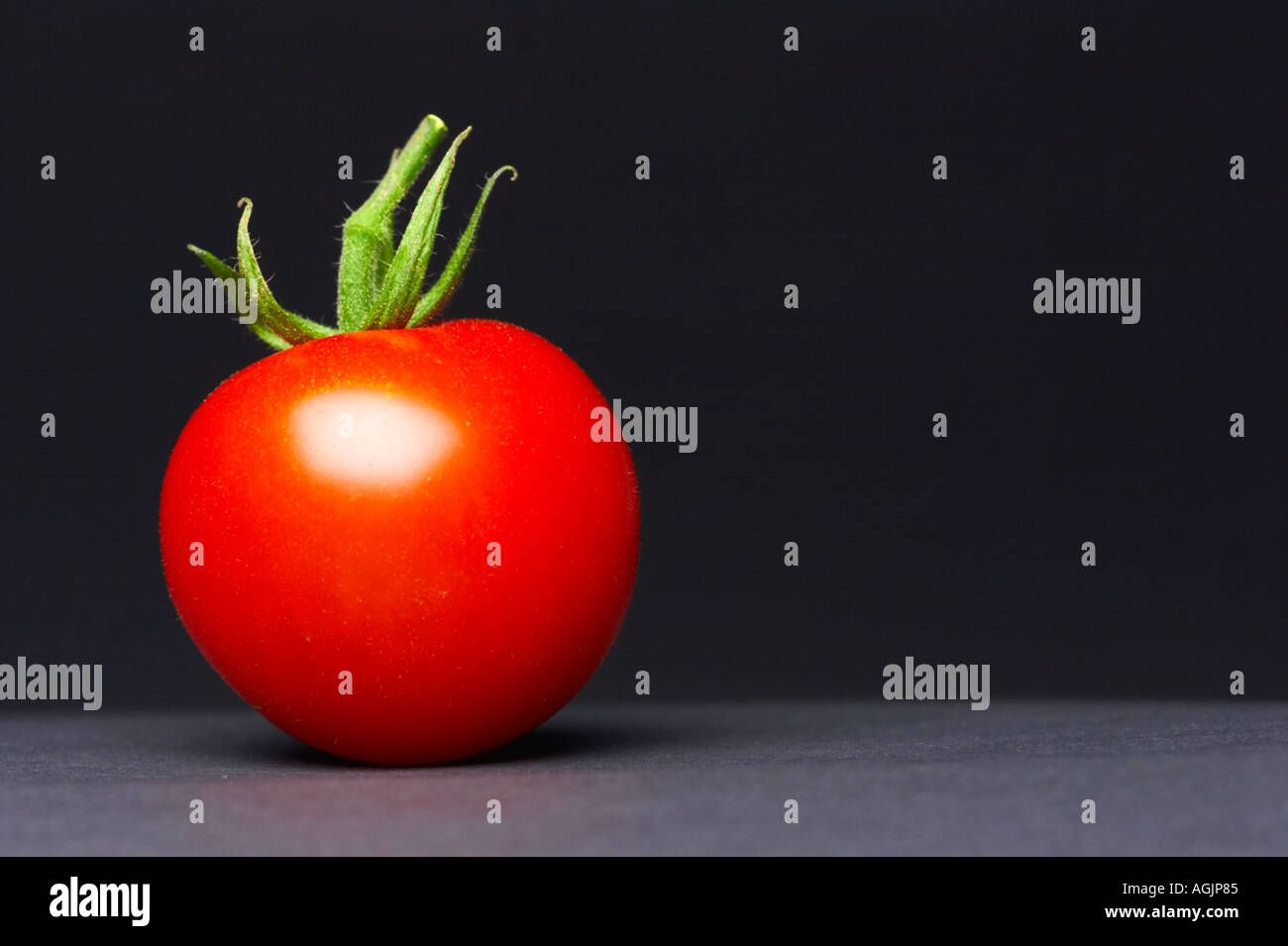 Abstract Tomato Cutout on Black Background Stock Photo - Alamy