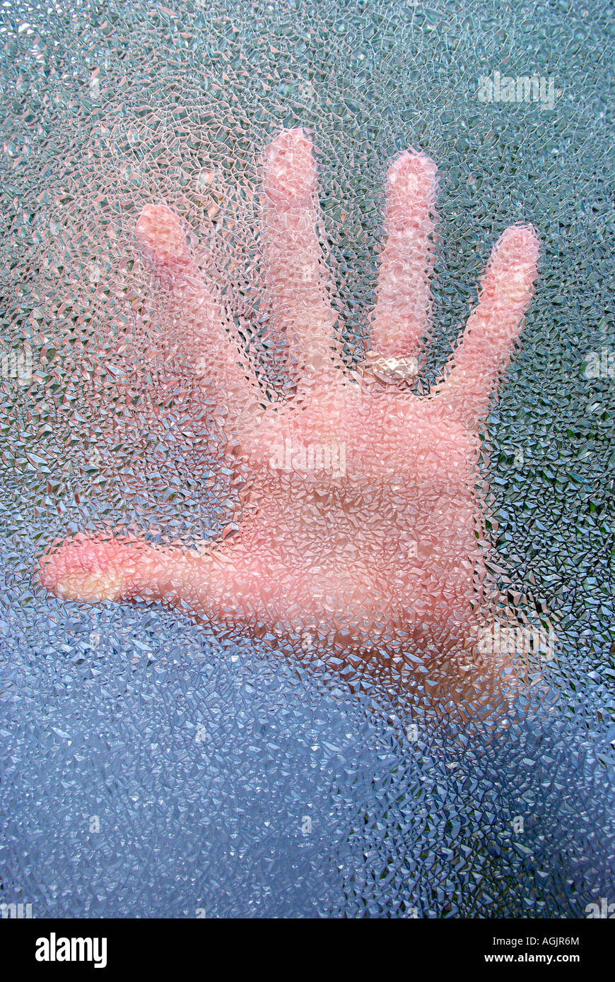 Hand on a glass window Stock Photo - Alamy