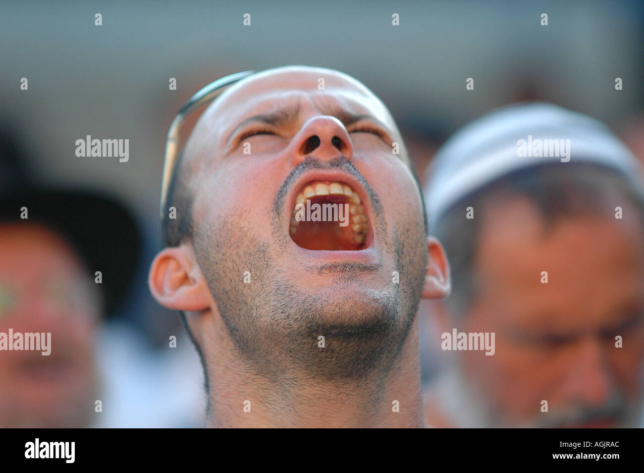 Jewish settlers praying at the Western wall Jerusalem against ...
