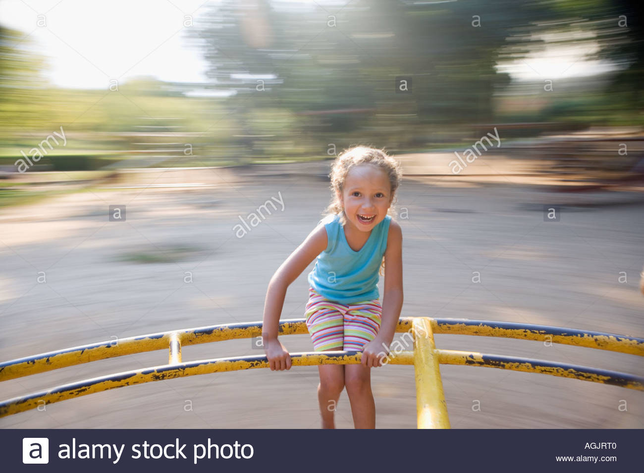 Child On Roundabout Stock Photos & Child On Roundabout Stock Images - Alamy