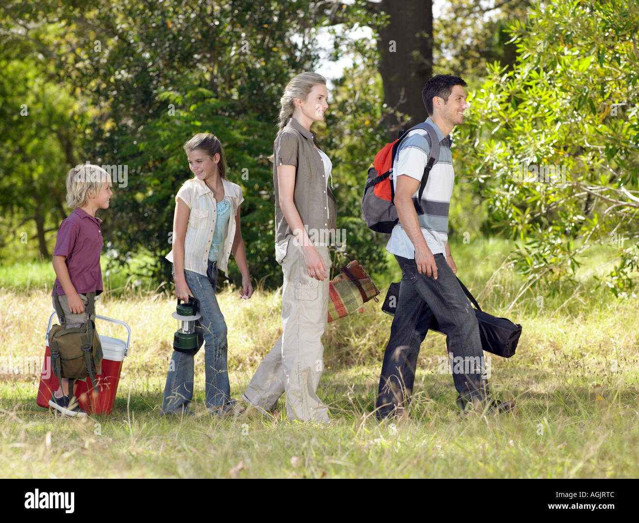 Family going camping Stock Photo - Alamy