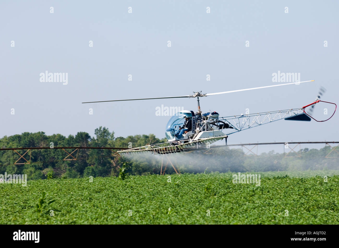 Helicopter crop spraying Stock Photo - Alamy